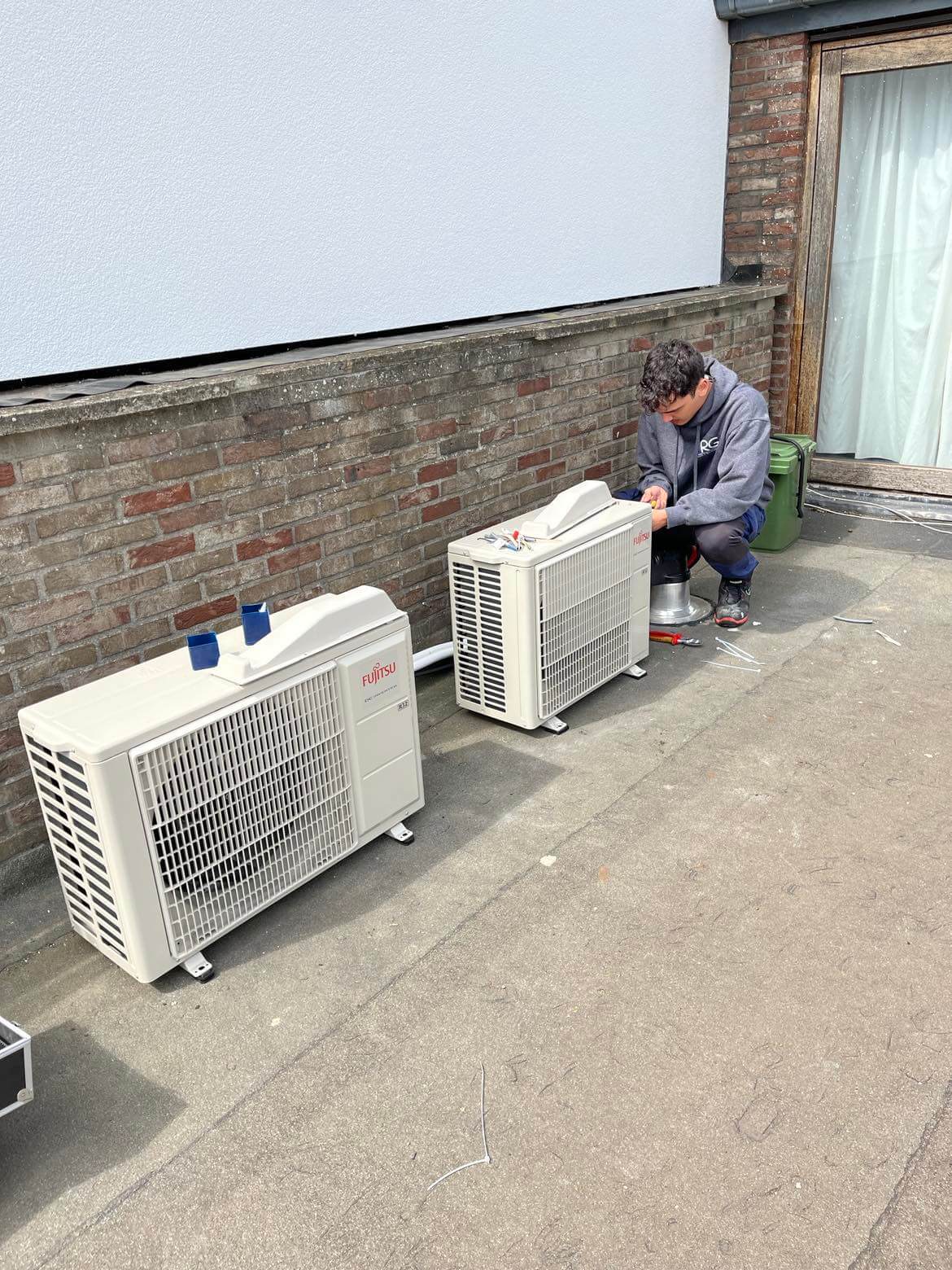 Installatie Fujitsu buitenunit airco / warmtepomp - RG